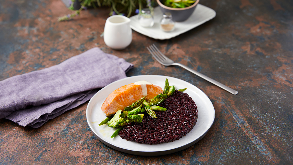 Salmon, purple rice, coconut and vegetables